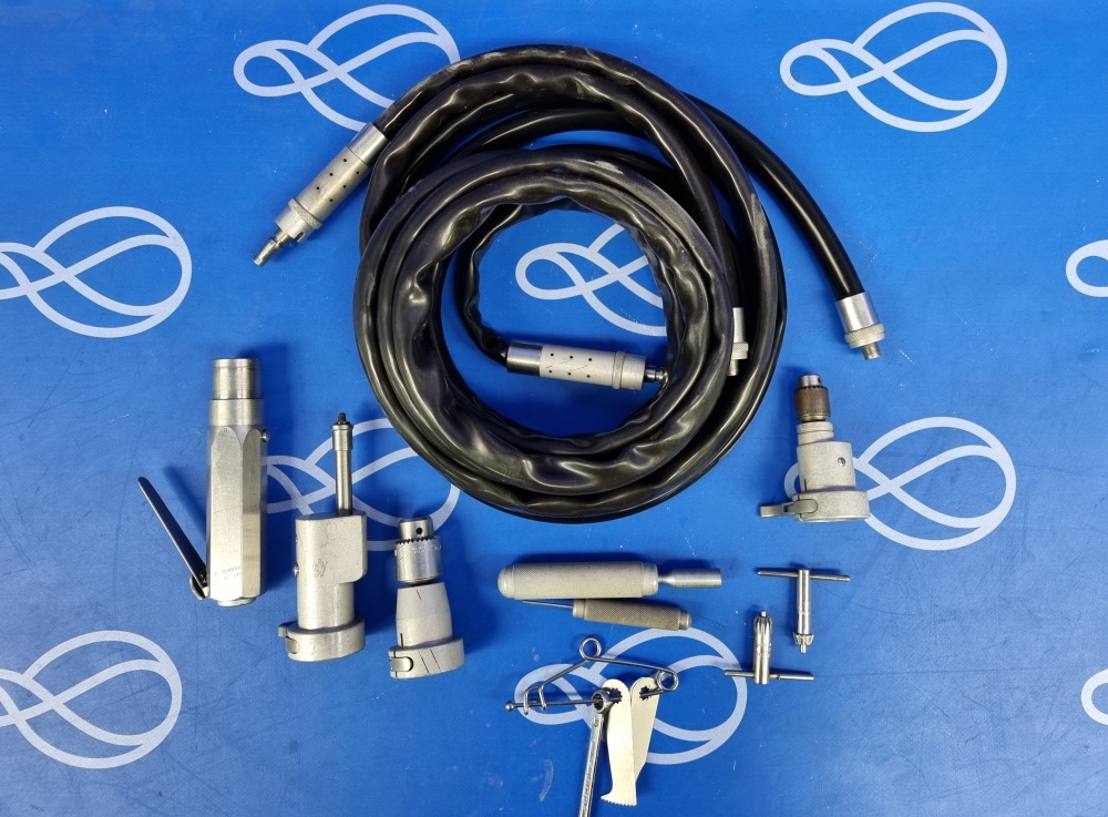 Howmedica Handpiece with Various Drill and Saw Attachments