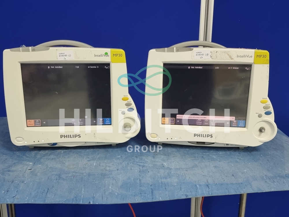 2 x Philips IntelliVue MP30 Patient Monitors *Both Power Up*, and 2 x ...